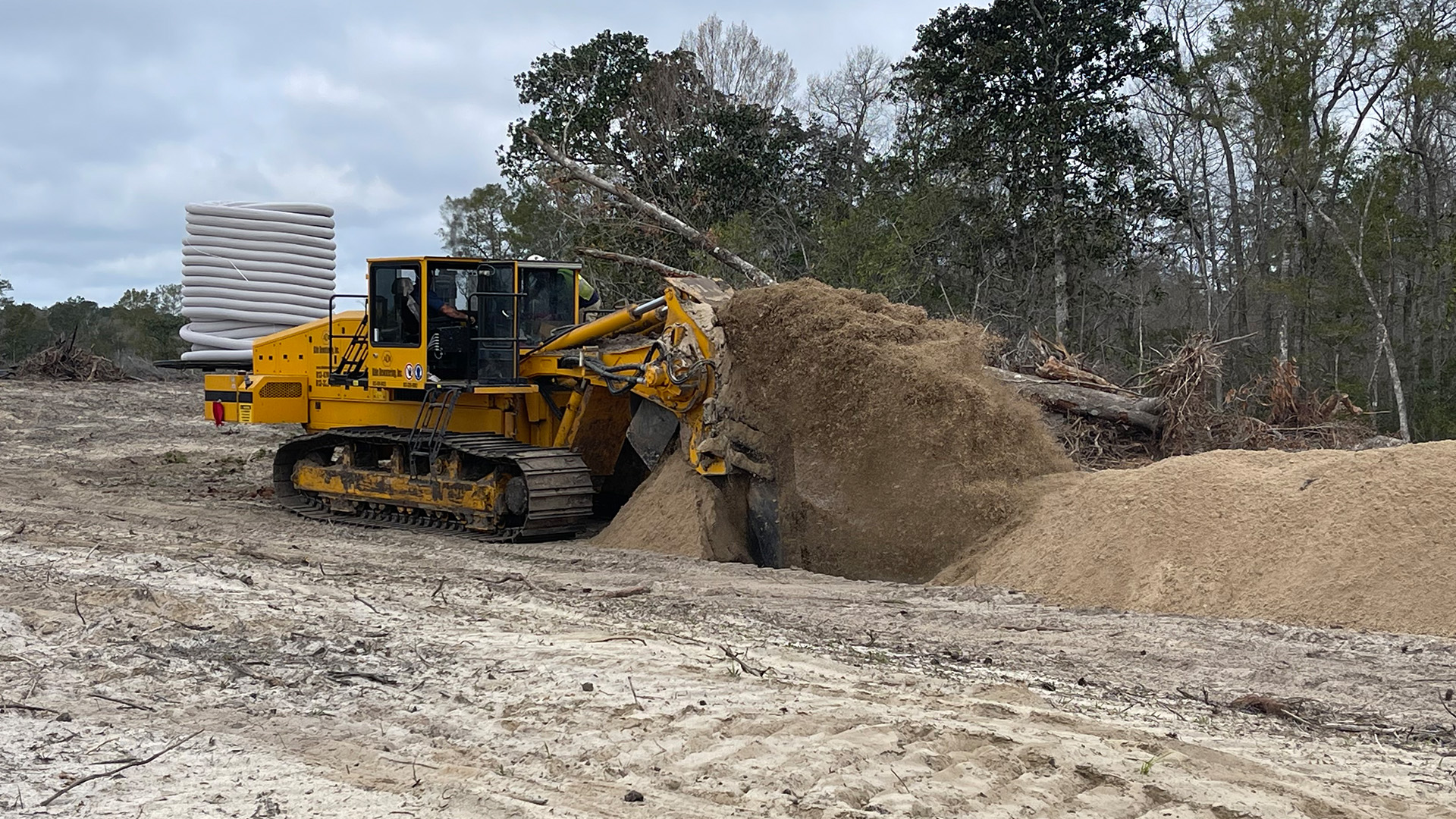 Sock Tile Trenching/Installation – Alpha Dewatering of Florida Inc.